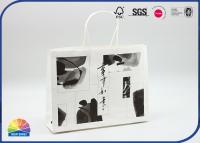 China Custom Printed White Kraft Paper Gift Bags With Twisted String Handles for sale