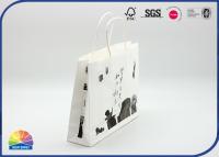 China Custom Printed White Kraft Paper Gift Bags With Twisted String Handles for sale