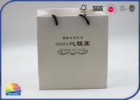 China Luxury Paper Gift Bag With Custom Logo Pantone Color Nylon Handle for sale