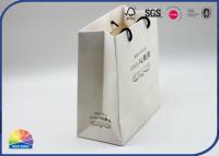 China Luxury Paper Gift Bag With Custom Logo Pantone Color Nylon Handle for sale