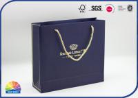 China Personalized Paper Gift Bag With Ribbon Handle CMYK Custom Print Coated Paper Bags for sale