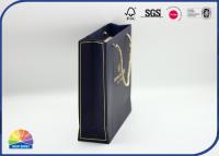 China Personalized Paper Gift Bag With Ribbon Handle CMYK Custom Print Coated Paper Bags for sale
