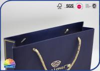 China Personalized Paper Gift Bag With Ribbon Handle CMYK Custom Print Coated Paper Bags for sale