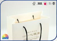 China Custom Printed Paper Gift Bag Portable Coated Flat Pack Shoe Medium Shipping Bags for sale