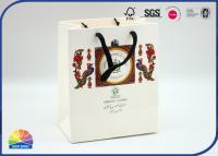 China 190gsm Solid Colored Art Paper Gift Bag With Ribbon Handle For Christmas Treat Bags for sale