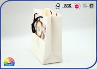 China 190gsm Solid Colored Art Paper Gift Bag With Ribbon Handle For Christmas Treat Bags for sale