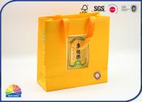 China Sturdy Fanny Paper Gift Bag with Gold Stamping Logo Custom Colored Printed for sale
