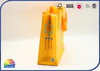 China Sturdy Fanny Paper Gift Bag with Gold Stamping Logo Custom Colored Printed for sale