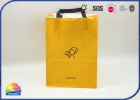 China 350g Orange Shopping Kraft Paper Gift Bags With Paper Handle Customized Logo for sale