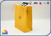 China 350g Orange Shopping Kraft Paper Gift Bags With Paper Handle Customized Logo for sale