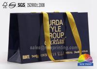 China Glossy Laminated Full Color Printed Custom Paper Garment Bags with Ribbon Handle for sale