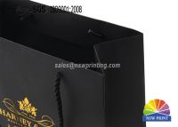 China Durable Black Cardboard Printed Paper Bags With Brand Monogram Gold Foil Stamping for sale