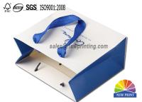 China Colored Cotton Flat Ribbon Handle White Cardboard Printed Paper Bags for sale