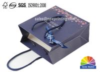 China Ribbon Decorated Custom Designed Paper Shopping Bags With Handles , Premium Printed for sale