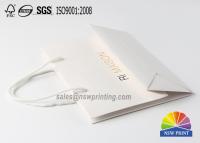 China High End Custom Hot Gold Stamping Embossing Logo White Shopping Paper Bag for sale