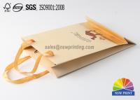 China Custom Excellent Handcraft CMYK Printing Wold Trade Paper Bag for sale