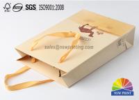 China Custom Excellent Handcraft CMYK Printing Wold Trade Paper Bag for sale