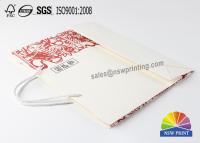 China Customizable Printing Cardboard Paper Shopping Bags With Cotton Rope Handle for sale