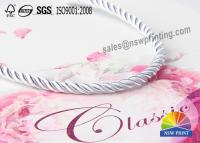 China PP Rope Handle 	Custom Paper Shopping Bags With Fancy Design Printing for sale