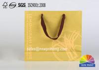China Custom Recycle Brown Kraft Portable Paper Gift Bags With Screen Printing for sale