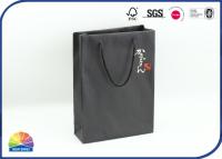 China 220gsm Black Kraft Paper Shopping Bags 4c Print Foil Stamping for sale