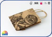 China Stand Up Packaging Kraft Paper Bags Black Printing With Handles for sale