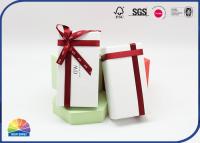 China Ribbon Bowknot Decorated Paper Rigid Gift Box Logo Silver Stamping for sale