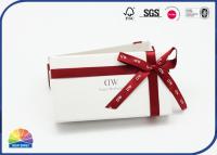China Ribbon Bowknot Decorated Paper Rigid Gift Box Logo Silver Stamping for sale