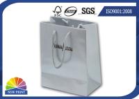 China Glossy / Matt Custom Printed Paper Bags With Handle Rope For Garment for sale