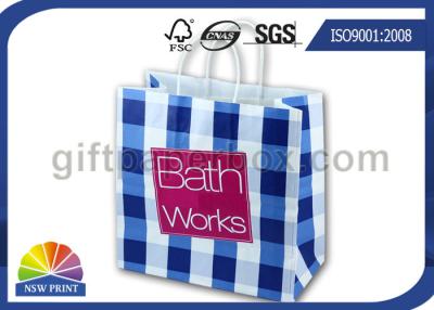 China Luxury Printed Kraft Paper Shopping Bag With Paper Twisted Handle For Apparel Store for sale