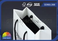 China Logo Embossing Custom Printed Paper Gift Bag with Ribbon Closure for Luxury Gift for sale