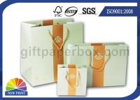 China Glossy Black Printed Paper Bags With PP Rope Handle , OEM / ODM Wrapping Bag for sale