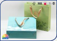 China Embossed Gold Logo Luxury Paper Shopping Bags With Ribbon Handles ！ for sale
