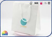 China 180gsm Biodegradable Printed Kraft Paper Shopping Bags With Handles for sale