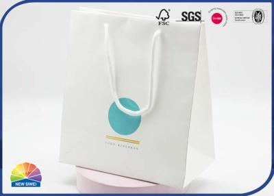 China 180gsm Biodegradable Printed Kraft Paper Shopping Bags With Handles for sale