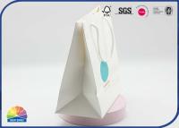 China 180gsm Biodegradable Printed Kraft Paper Shopping Bags With Handles for sale
