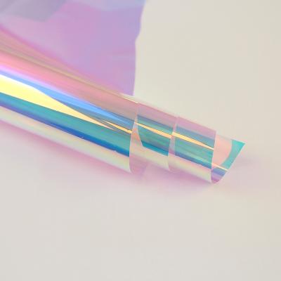 China Factory Wholesale Colorful Holographic Film Blue Base Golden Light PET Iridescent Film Roll Translucent Decorative Wrapping Film for sale