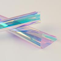 China Factory Wholesale Color Laser Paper Blue Base Golden Light PET Rainbow Film Iridescent Film Roll Translucent Material for Decoration Packaging for sale