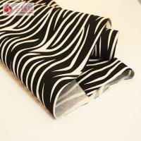 China Long Pile Zebra Embossed Polyester Non Woven Flocked Velvet Fabric For Pouch Package for sale