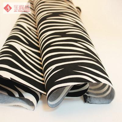China Contemporary Upholstery Stripe Polyester Non Woven Fabric For Gift Box Lining for sale