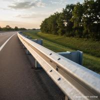 China Hot-dip Galvanized M180 Steel Guardrail W-beam Bolted Connection 80cm Height 2m Post Spacing Highway Safety for sale