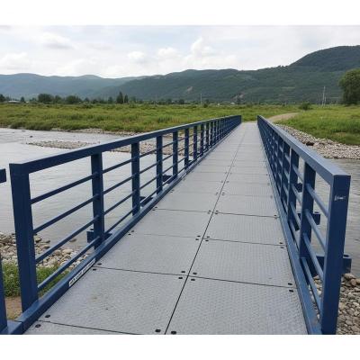 China Steel Pedestrian Bridge 400-600 kg/m² Load Capacity Prefabricated Sections Anti-Skid Deck for Safe Crossings for sale