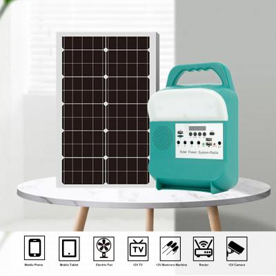China Power Supply 12V Portable Solar Home Generator With Radio Solar Energy Light for sale