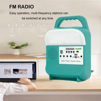 China Portable Professional Camping Solar Kits LED Light Energy System Fm Radio Lamp for sale