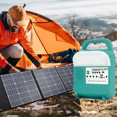 China LED Light Solar Home Lighting System Kits Portable Camping Lamp Torch Radio for sale