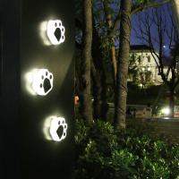 China 5000K 70lm Solar Decorative Lights Plug In Cat Paw Print Solar Lawn Lamp for sale