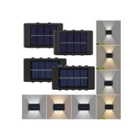 China Glowing Waterproof Atmosphere Wall Light 600mah Solar LED Outdoor Decorative Garden for sale