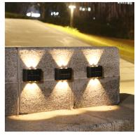China Glowing Waterproof Atmosphere Wall Light 600mah Solar LED Outdoor Decorative Garden for sale
