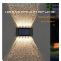China Glowing Waterproof Atmosphere Wall Light 600mah Solar LED Outdoor Decorative Garden for sale