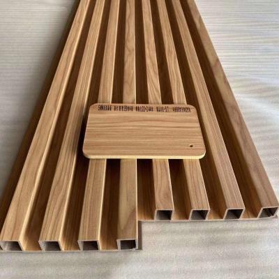 China Customized Wood Grain Pvc Wpc Wall Panels Designs For Decoration 170*20mm for sale